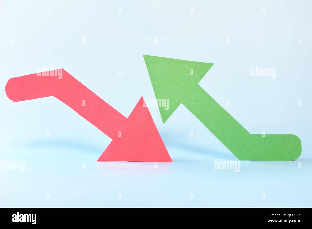 Red downward arrow and green upward arrow. Bearish versus Bullish ...