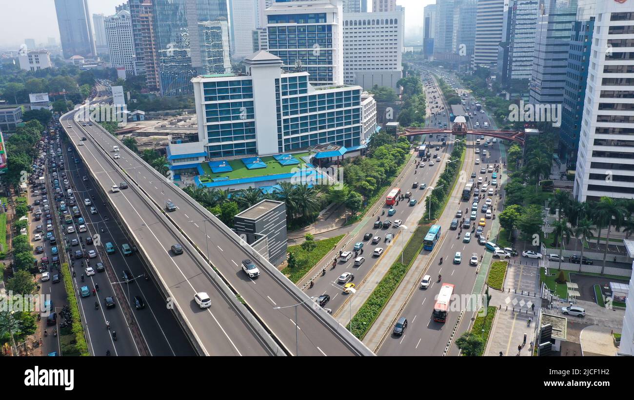 Highway multi-level interchange road with moving cars. Cars are moving ...