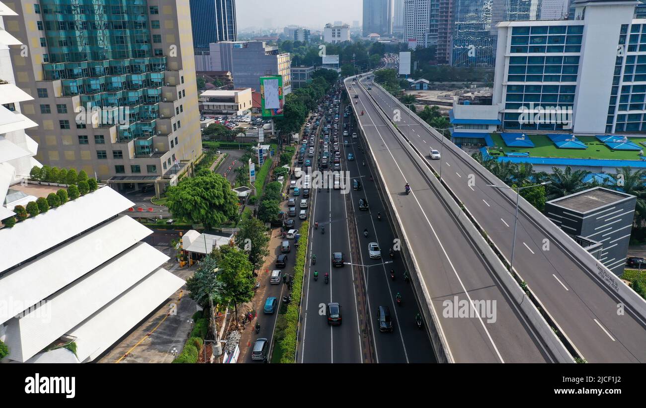 Highway multi-level interchange road with moving cars. Cars are moving ...