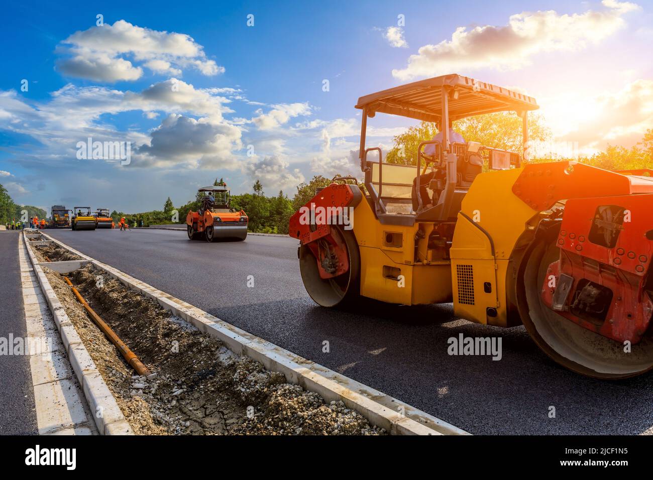 Construction site is laying new asphalt pavement. road construction ...
