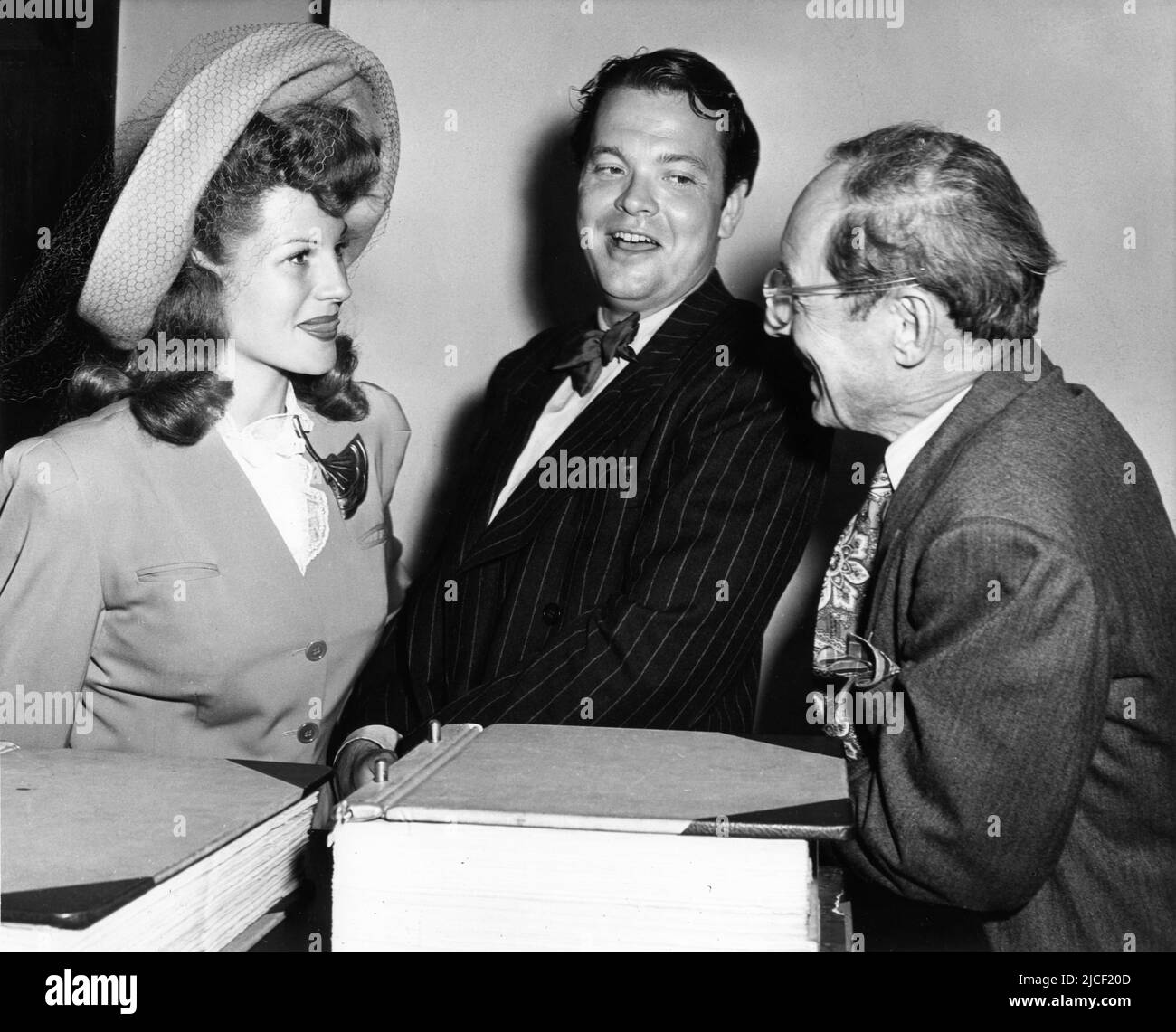 RITA HAYWORTH and ORSON WELLES with Judge ORLANDO H. RHODES at their ...