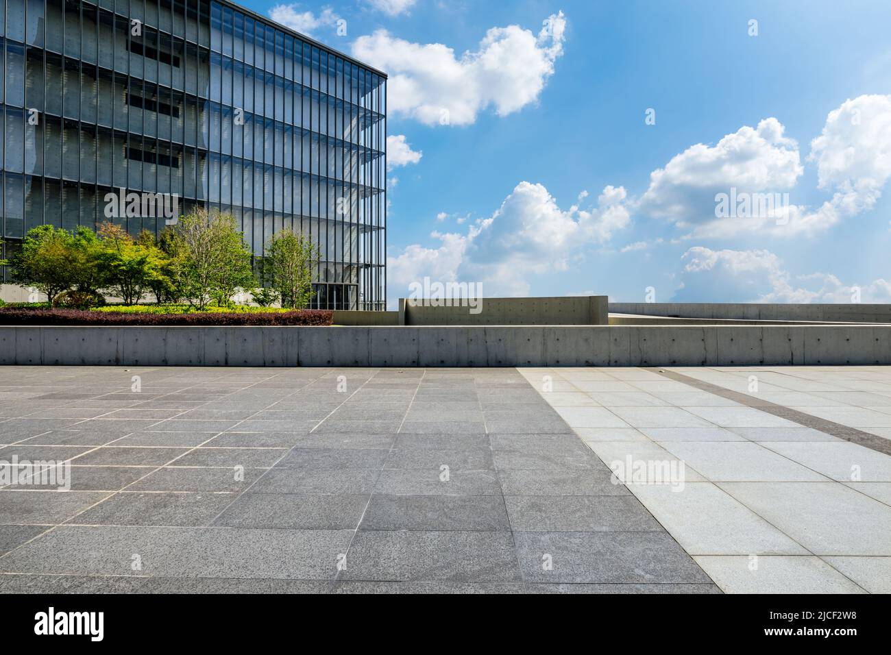Empty square floor and city skyline with modern commercial buildings in ...