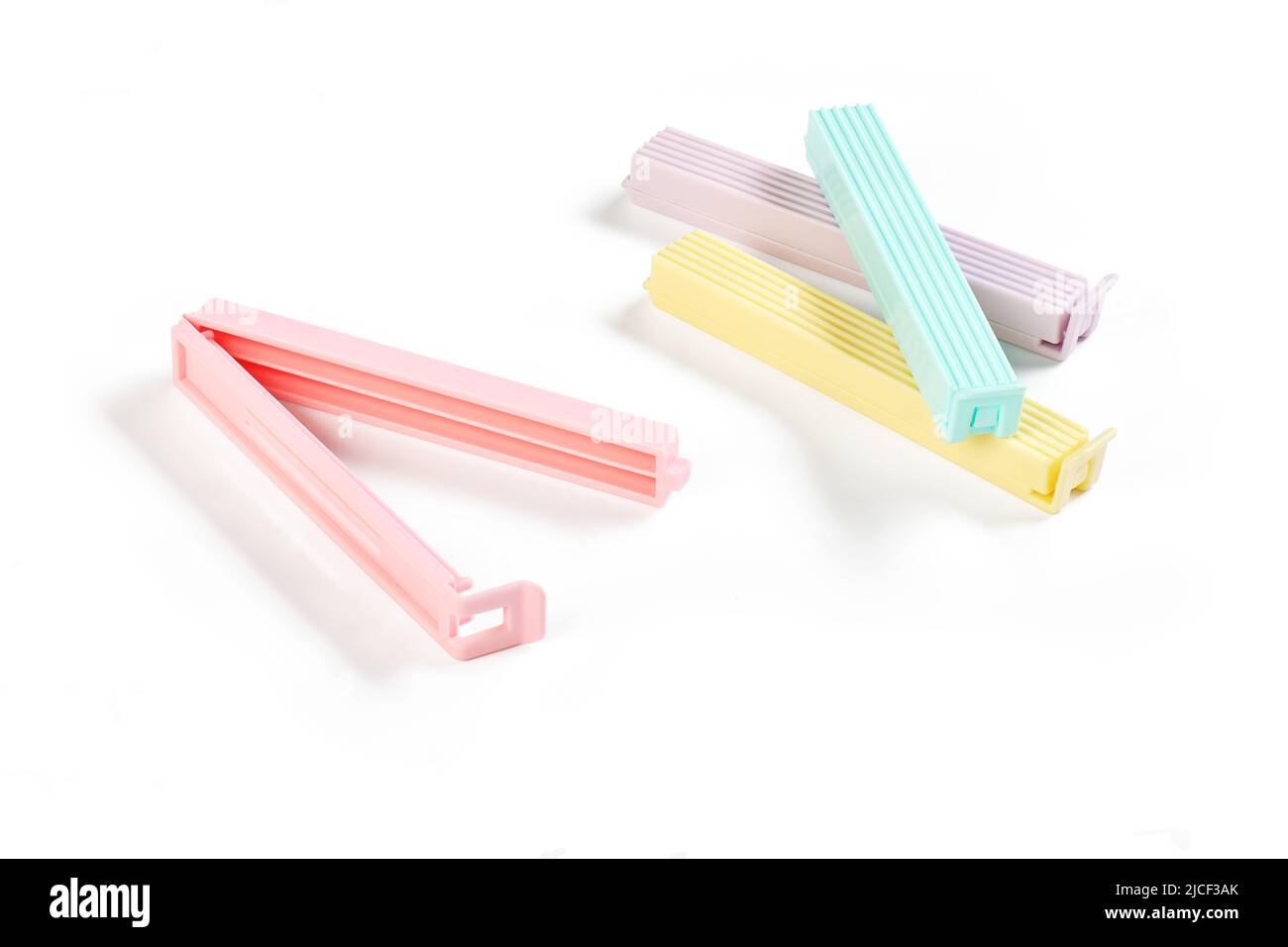 Plastic bag clips on a white background, photo stacking Stock Photo - Alamy