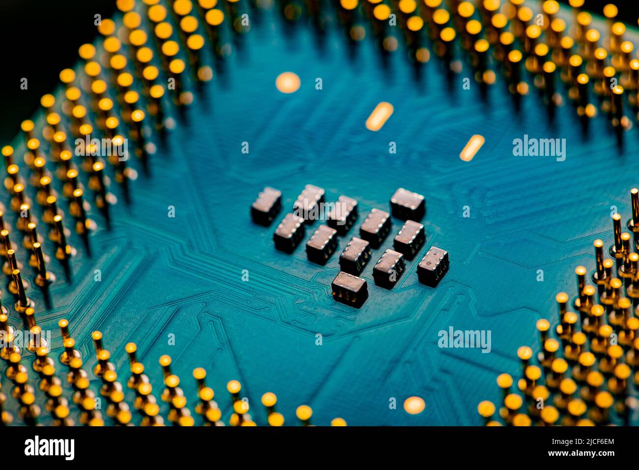 Macro Close up of microchips and pins on Main CPU PC processor circuit ...