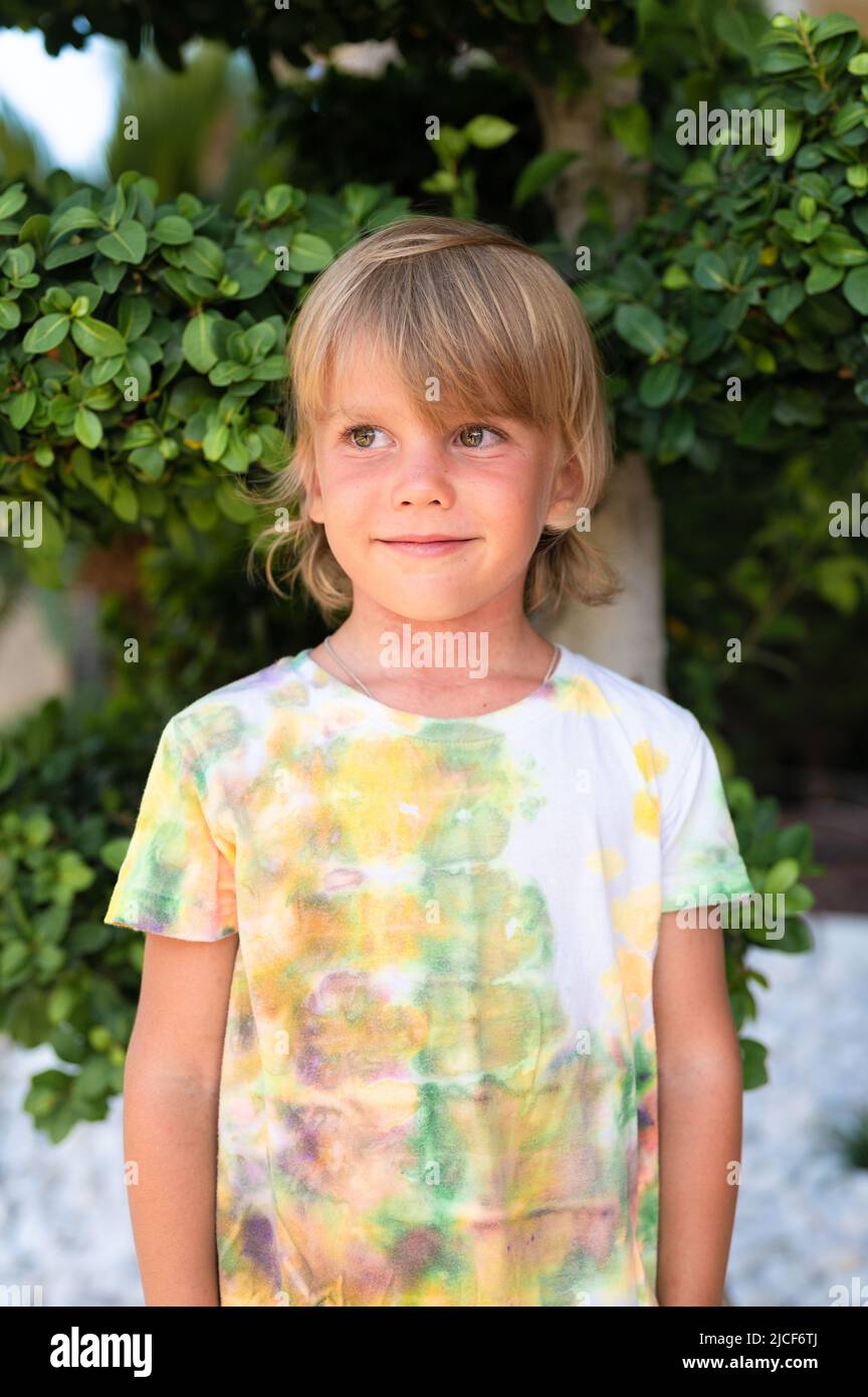 portrait face of candid happy little kid boy of five years old with ...
