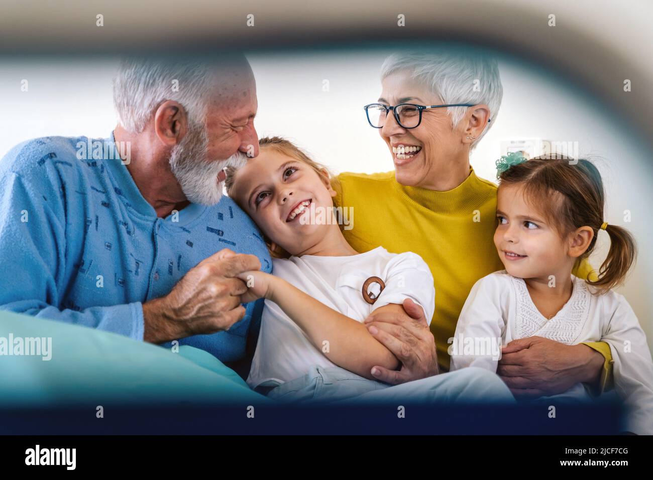 Happy children having fun and love with their grandparents together ...