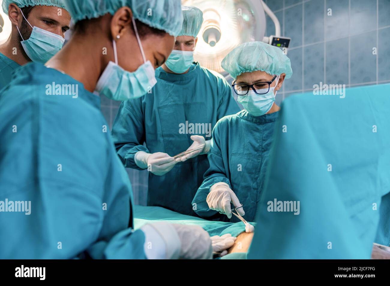 Team of surgeon at work in operating room. Healthcare, hospital concept ...