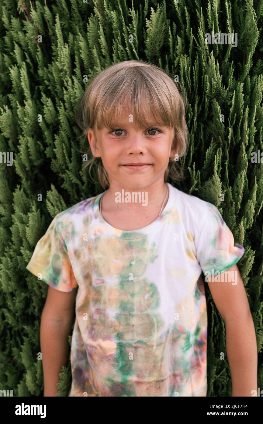 portrait face of candid happy little kid boy of five years old with ...