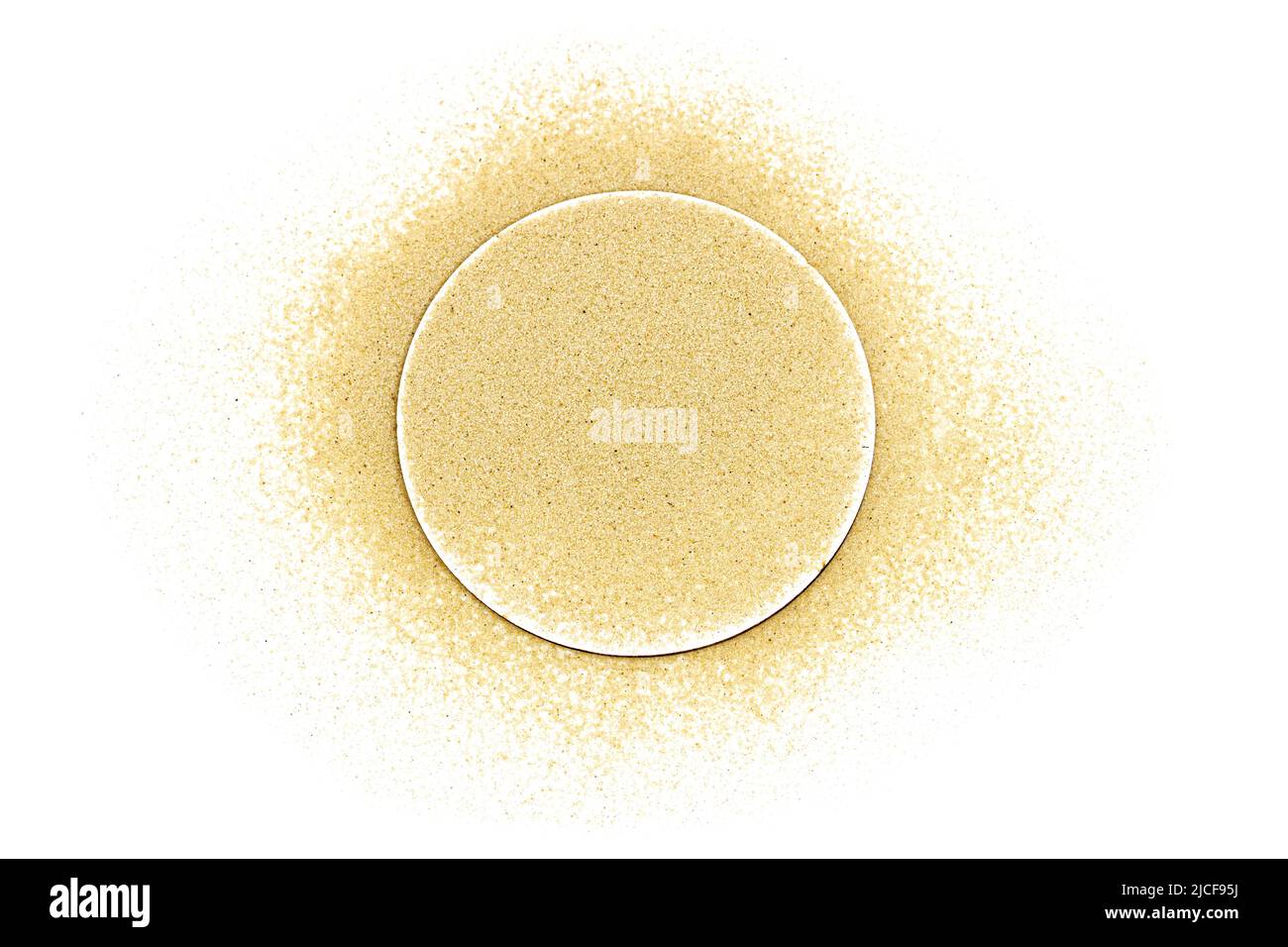 White circle paper shape covered with sand Stock Photo - Alamy