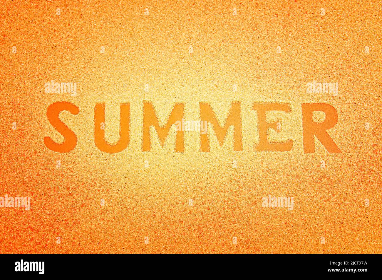 Lettering SUMMER made on a sandy background. Hot summer vacation ...