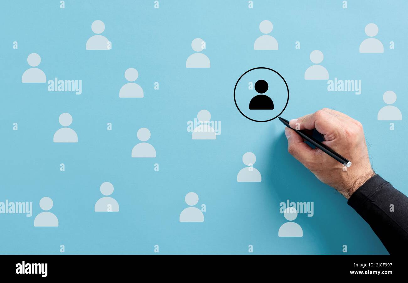Male hand draws a circle around the employee icon. HR, human resources ...