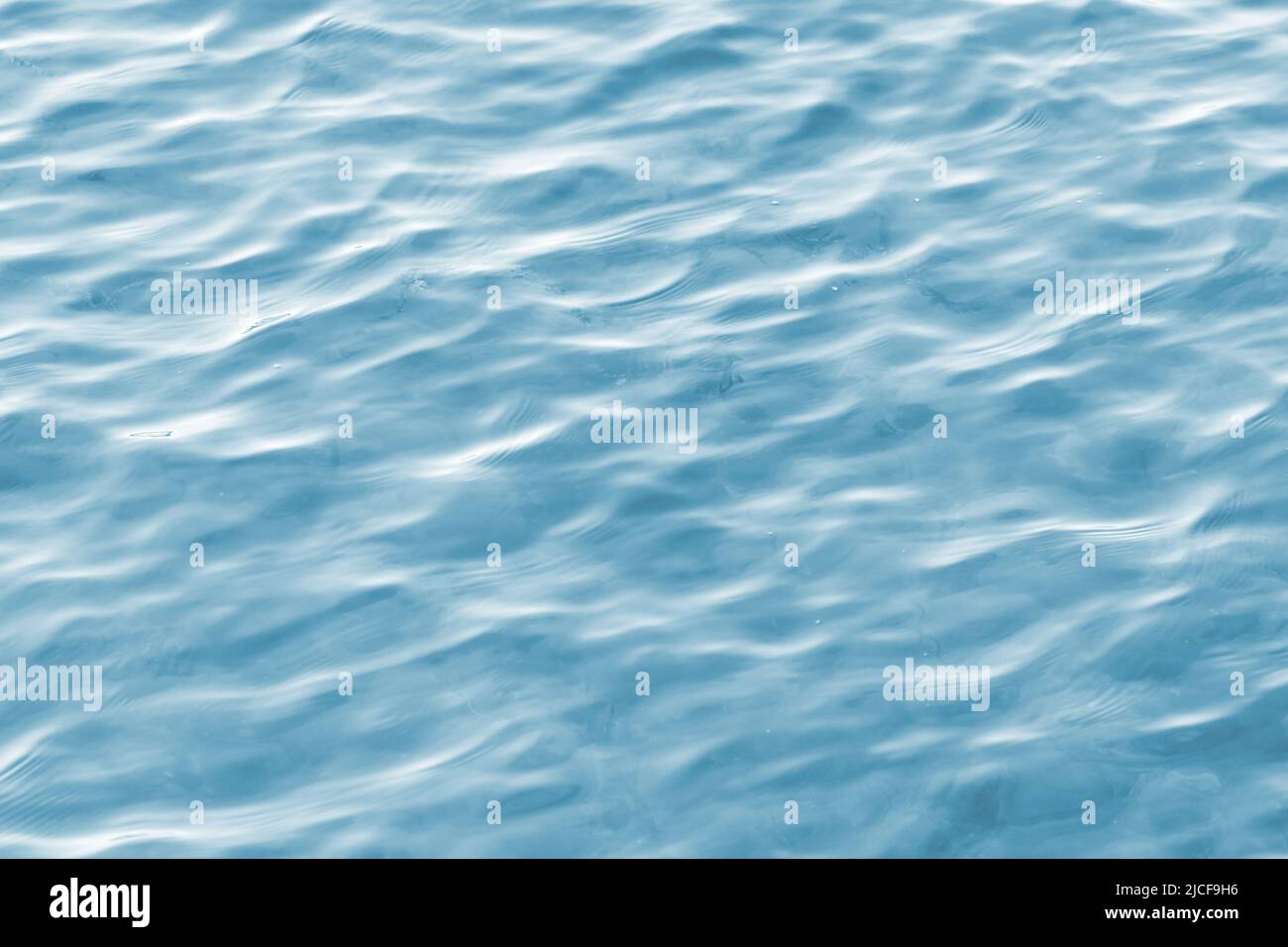 Light blue water surface background. Full frame photography Stock Photo ...