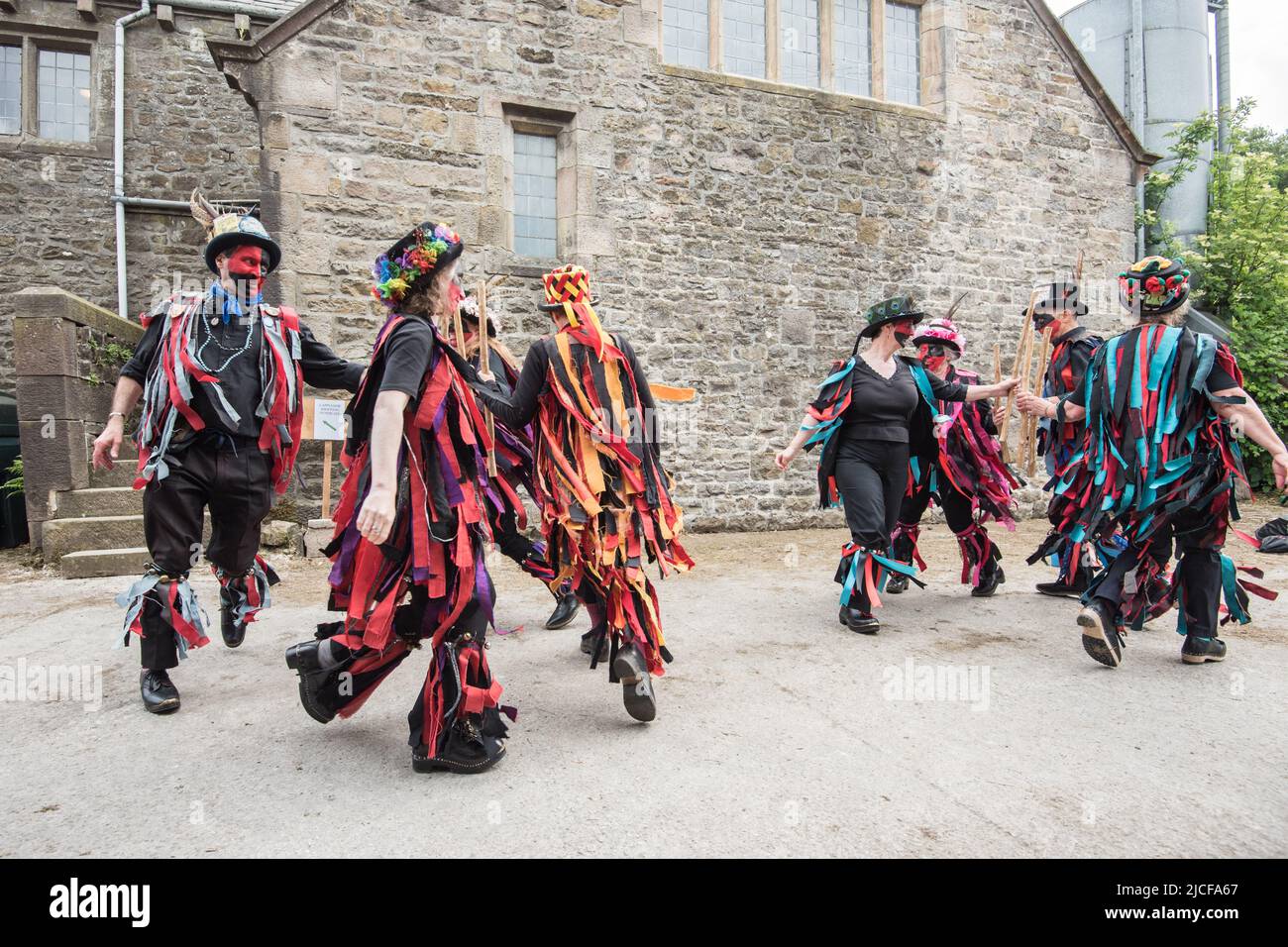 Flagcrackers of Craven border morris side in colourful rag jackets ...