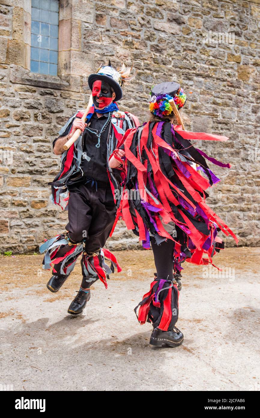 Flagcrackers of Craven border morris side in colourful rag jackets ...
