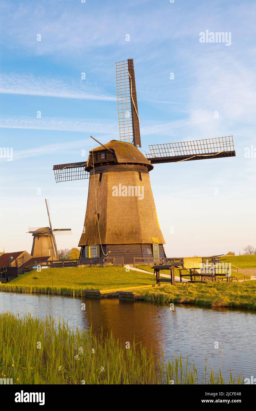 Traditional windmills along a canal hi-res stock photography and images ...