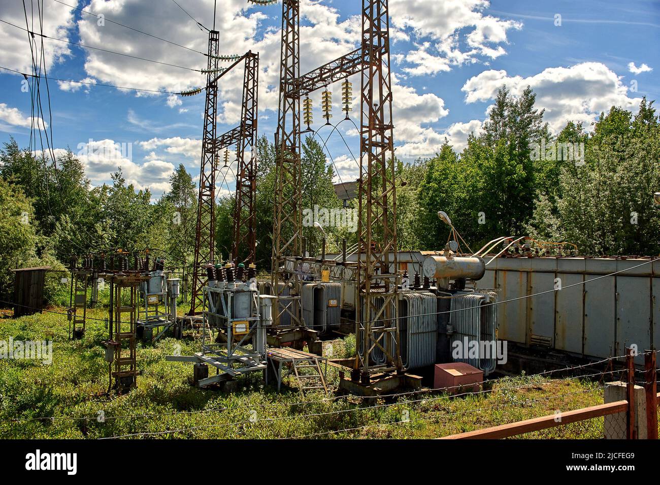 high-voltage electrical substation against the blue sky Stock Photo - Alamy