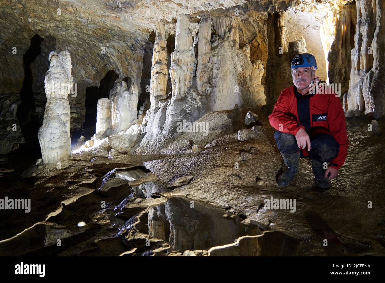 Cave explorer in the Grotto de la Tuilerie in France Stock Photo - Alamy