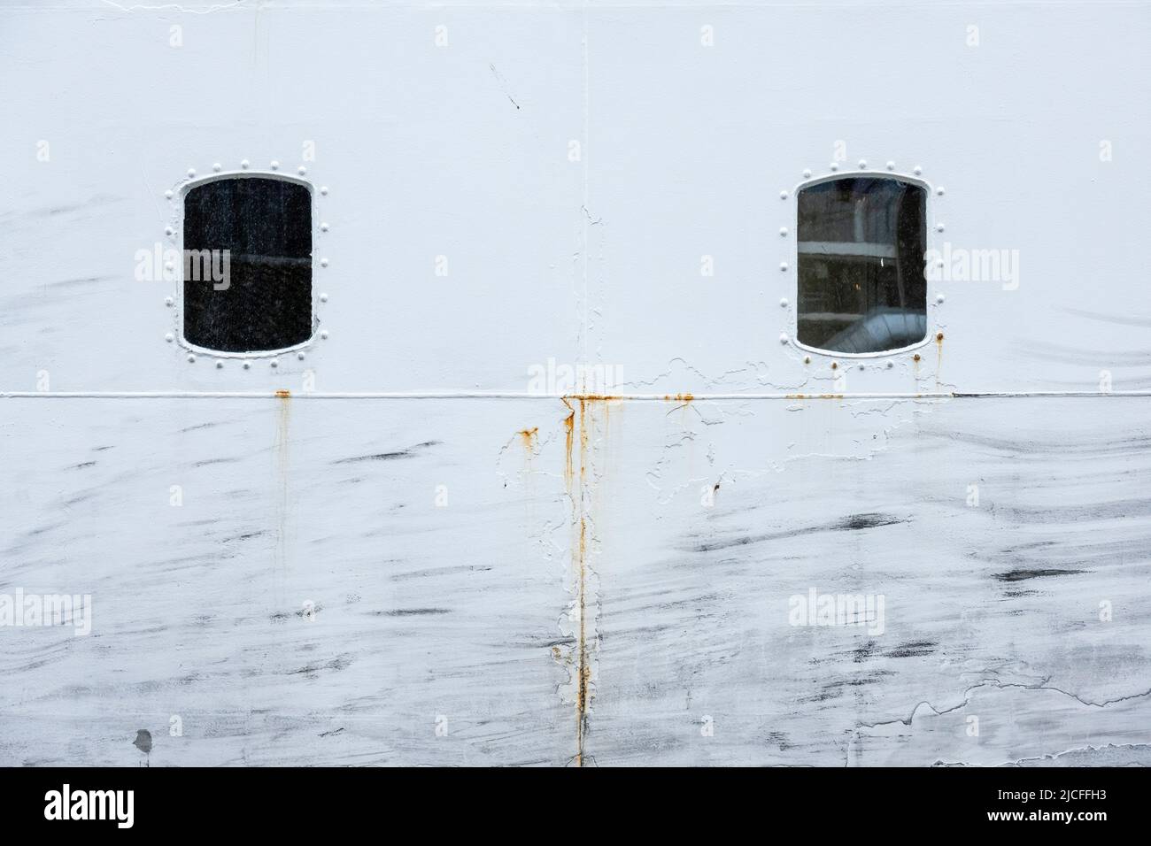 Ship wall with windows Stock Photo - Alamy