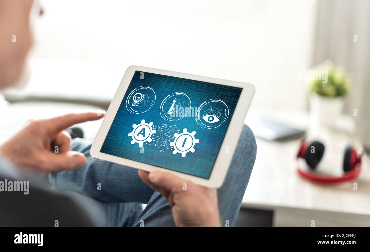 Tablet screen displaying an ai concept Stock Photo - Alamy