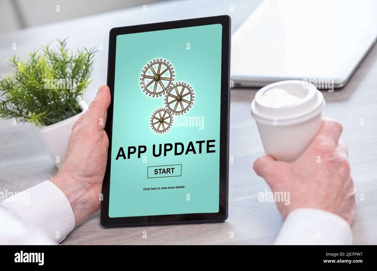 Tablet screen displaying an application update concept Stock Photo - Alamy