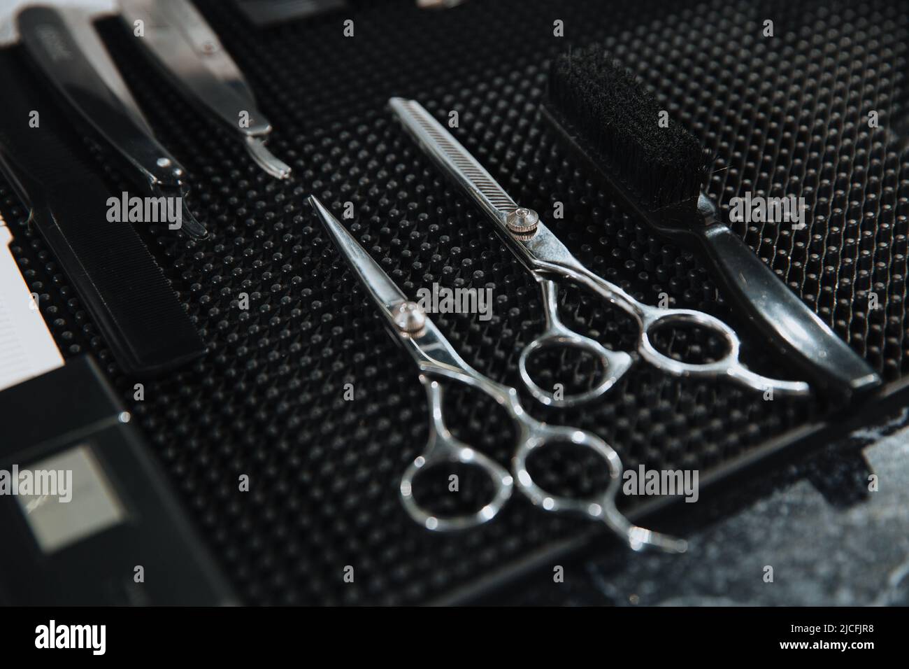 Professional scissors on black background. Hairdressing industry ... Professional scissors on black background. Hairdressing industry ...