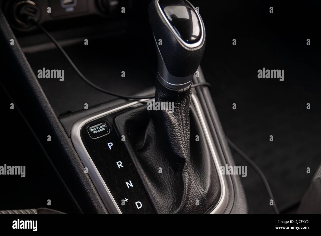 Automatic shift gear knob in the passenger compartment of the car in ...