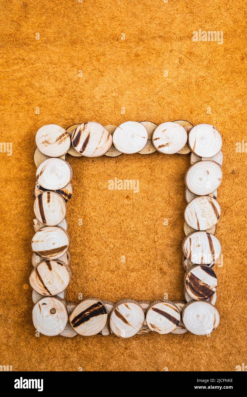 Frame from wooden discs Stock Photo - Alamy