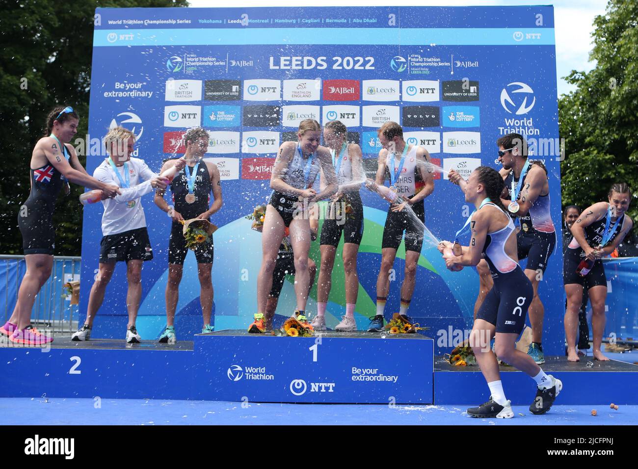 Athletes celebrate their podium finishes during day two of the 2022 ...