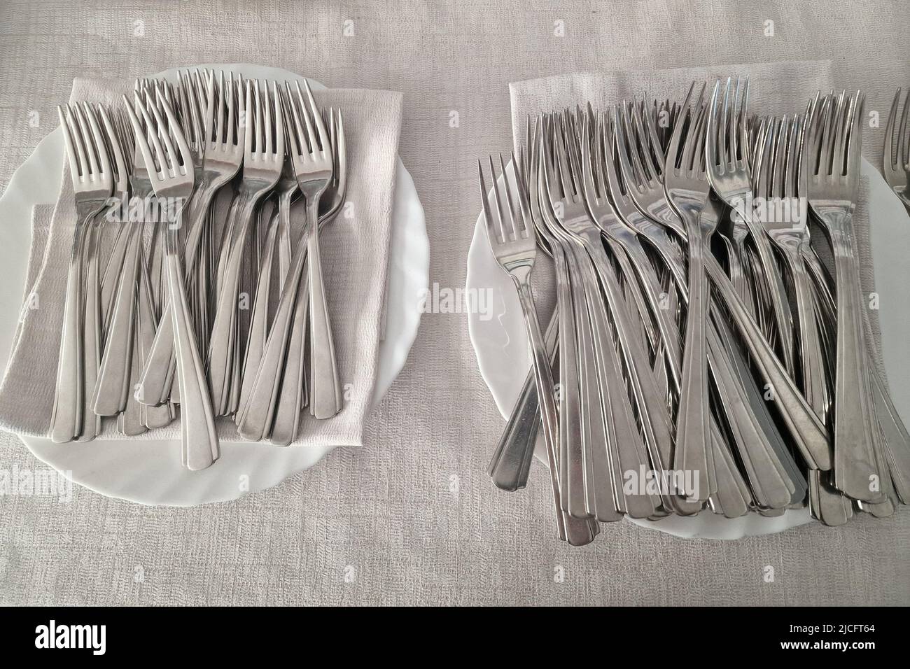 Silverware on the table detail Stock Photo - Alamy