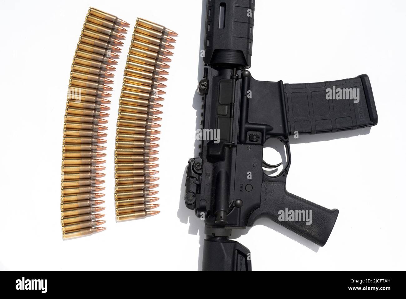 An AR-15 type rifle (without a magazine) and 60-rounds of 5.56mm ammo ...