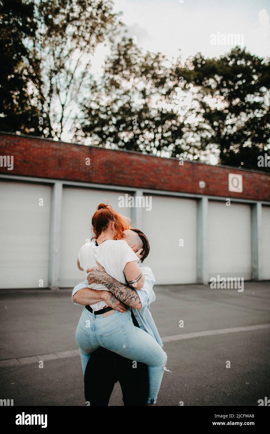 Young couple in love, outside Stock Photo - Alamy