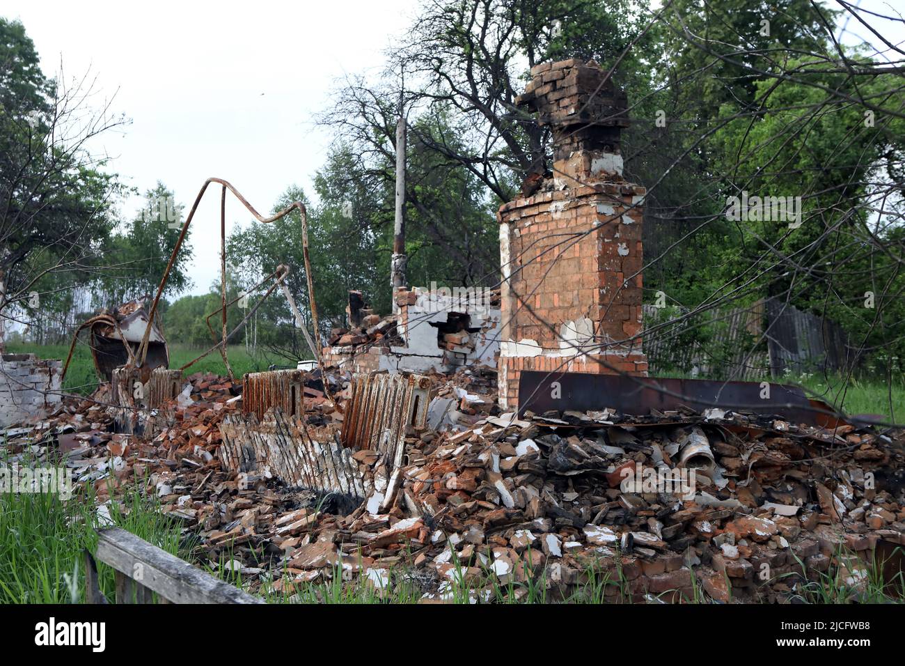 KYIV REGION, UKRAINE - JUNE 4, 2022 - The chimney remains standing ...