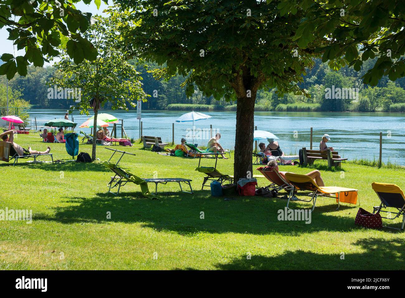 Germany, Baden-Wuerttemberg, Rheinbad Schwörstadt, sunbathing lawn ...