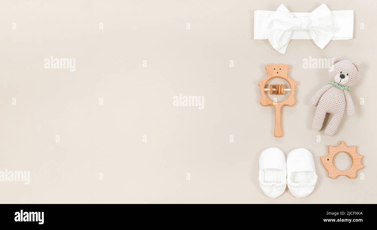 Baby booties and headband banner with copy space in eco-friendly style ...
