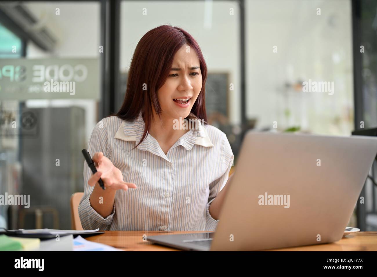 Unhappy asian businesswoman or female boss dissatisfied and getting ...