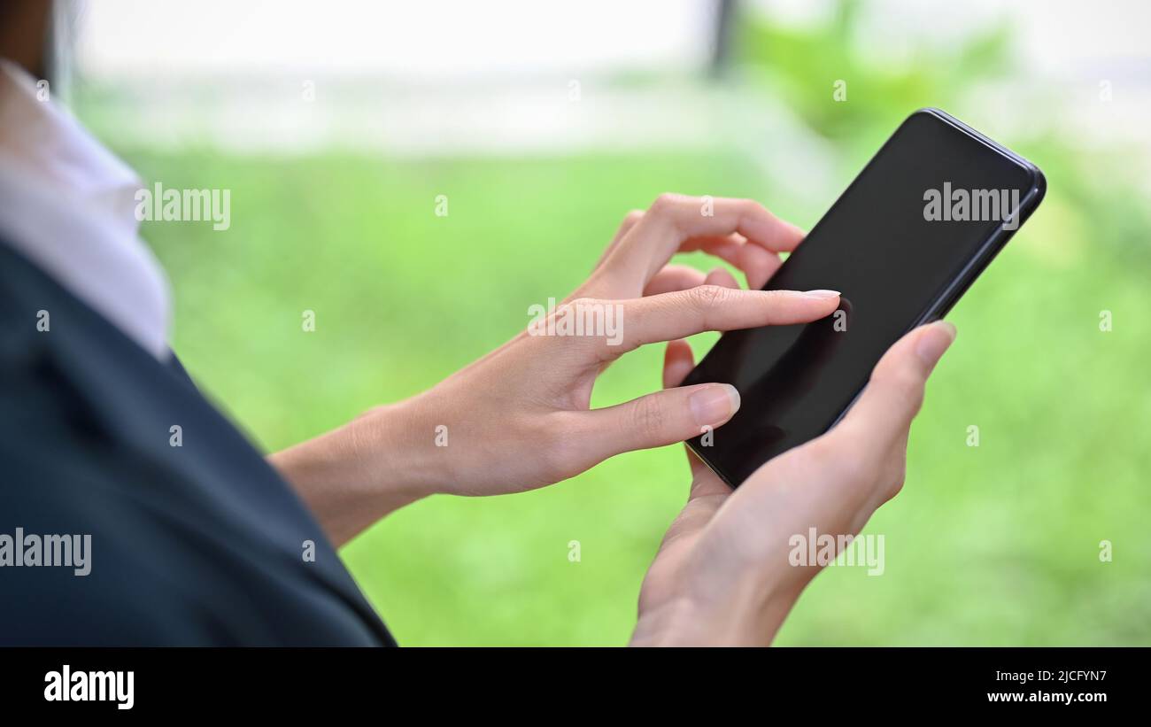 Close-up and focus hands image, A female using modern smart mobile ...