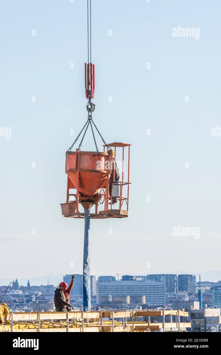 Vienna, construction site of apartment house, crane, concrete bucket or ...