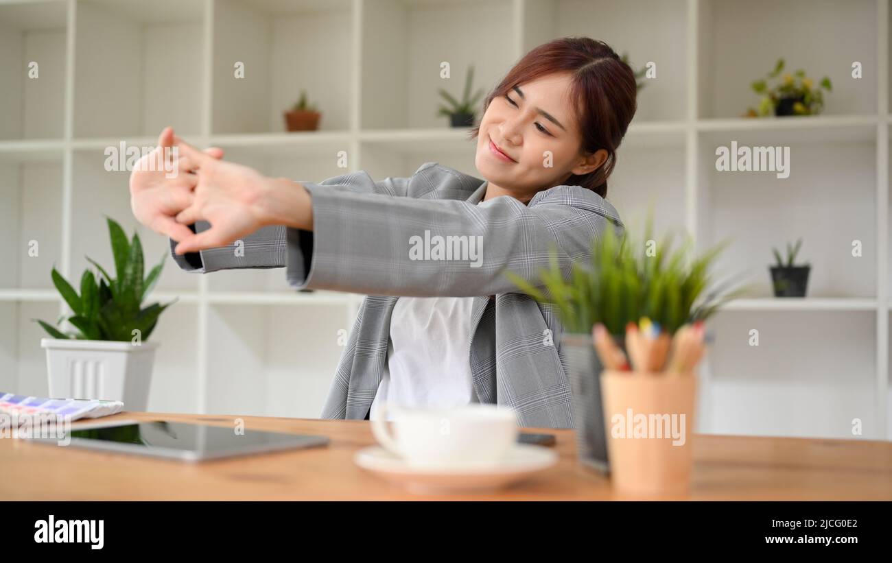 Attractive and charming businesswoman or female company employee ...