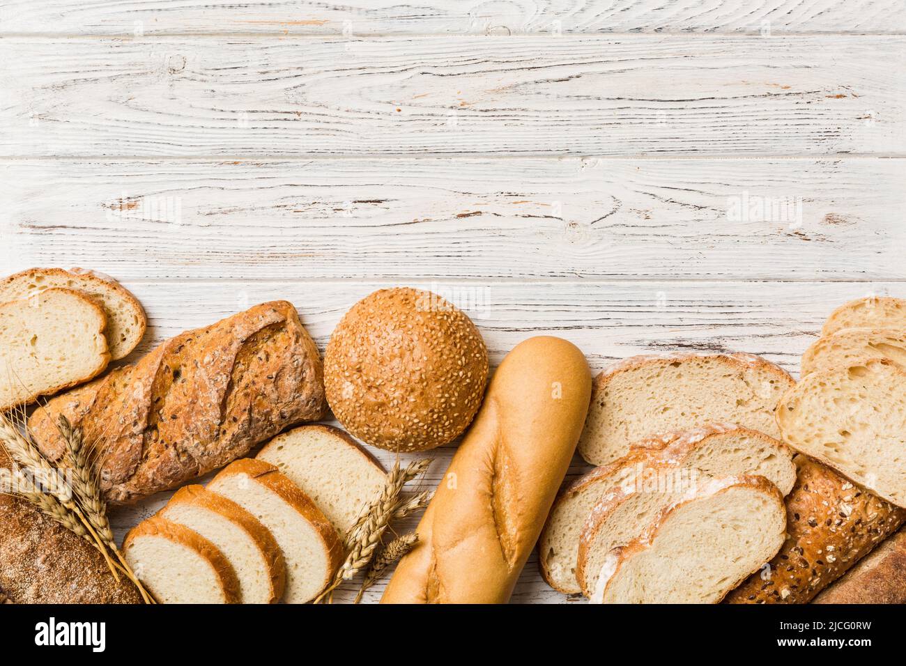 Homemade natural breads. Different kinds of fresh bread as background ...