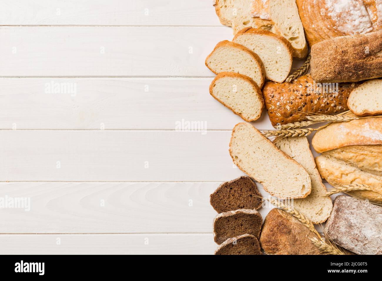 Homemade natural breads. Different kinds of fresh bread as background ...
