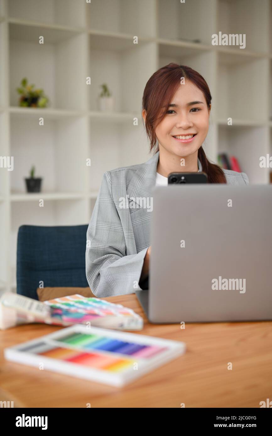Portrait happy graphic designer hi-res stock photography and images - Alamy