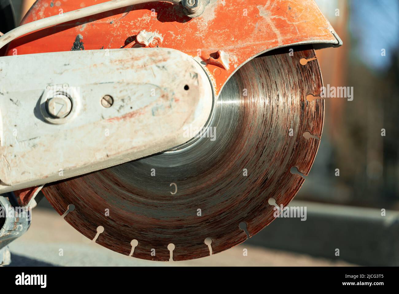 close-up of a saw with a disc for cutting concrete and paving slabs ...