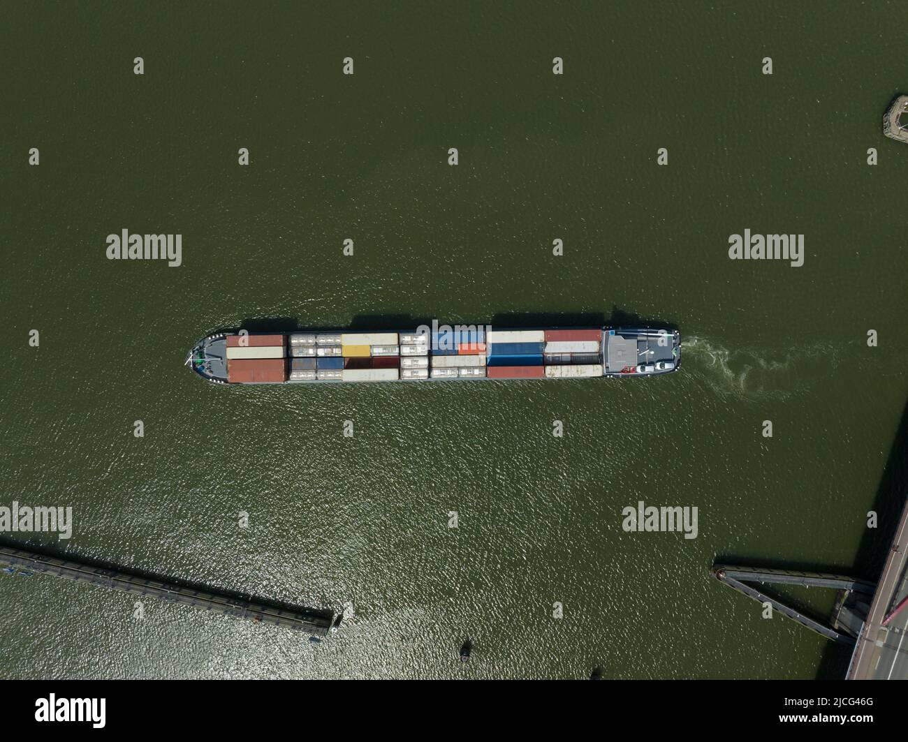 Heavy transport container bulk carrier freighter overhead top down view ...