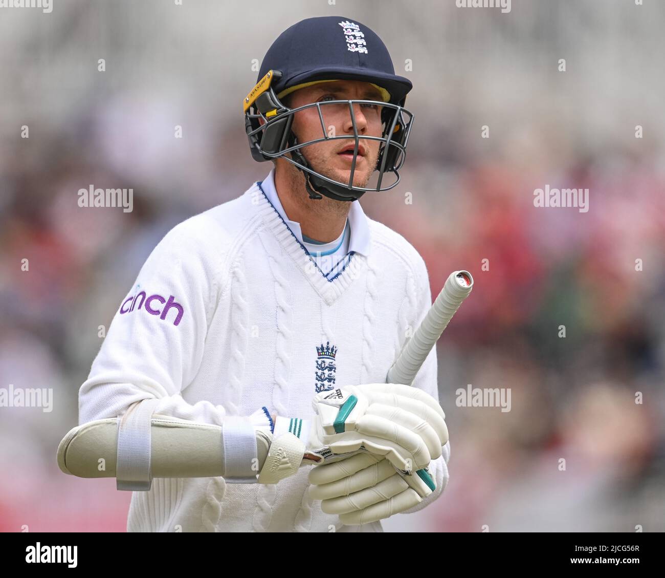 Stuart Broad of England walks back to the pavilion after losing his ...