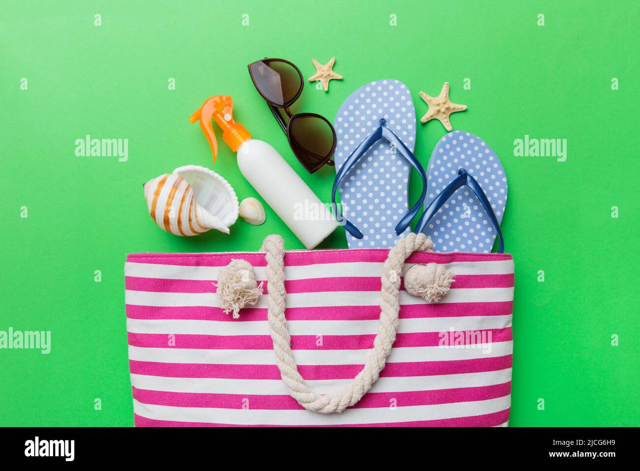 beach accessories flat lay top view on colored background Summer travel ...