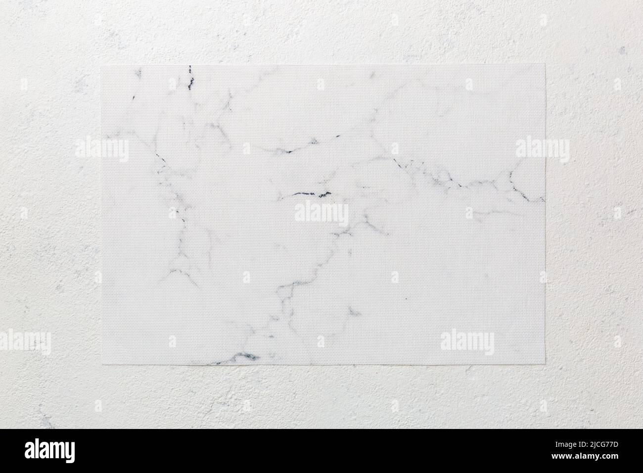 Top view of light tablecloth for food on cement background. Empty space ...