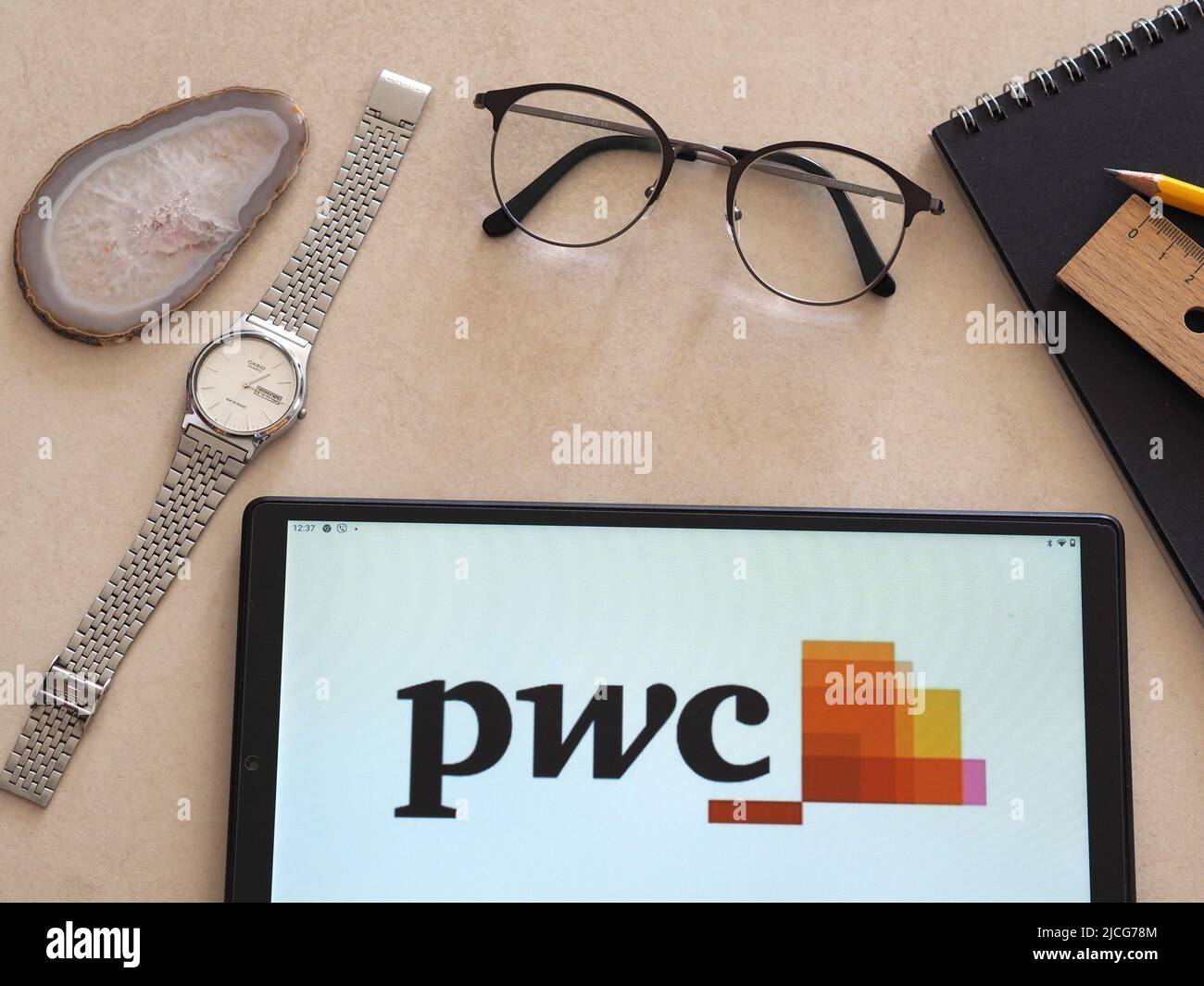 In this photo illustration PricewaterhouseCoopers (PWC) logo seen ...