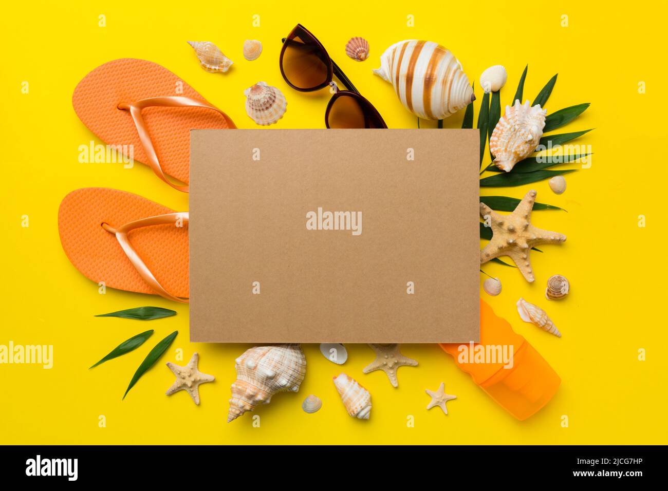 Summer time concept with blank greeting card and blank craft paper on ...