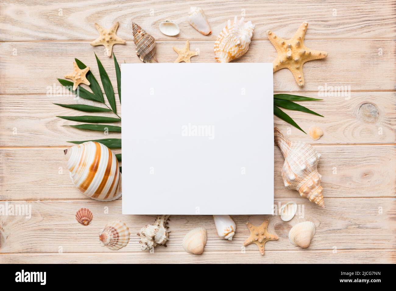 Summer time concept with blank greeting card and blank white paper on ...