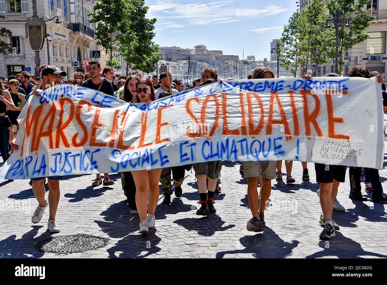 Marseille, France. 11th June, 2022. Protesters hold a banner expressing ...